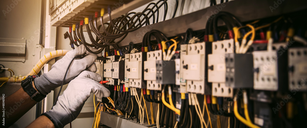 Electricity and electrical maintenance service, Engineer using ...