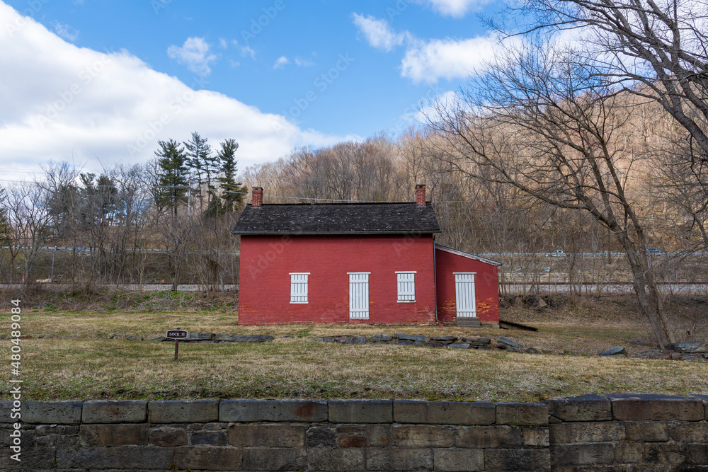 The lockhouse at Lock 31 on the Chesepeake and Ohio canal. Painted red ...