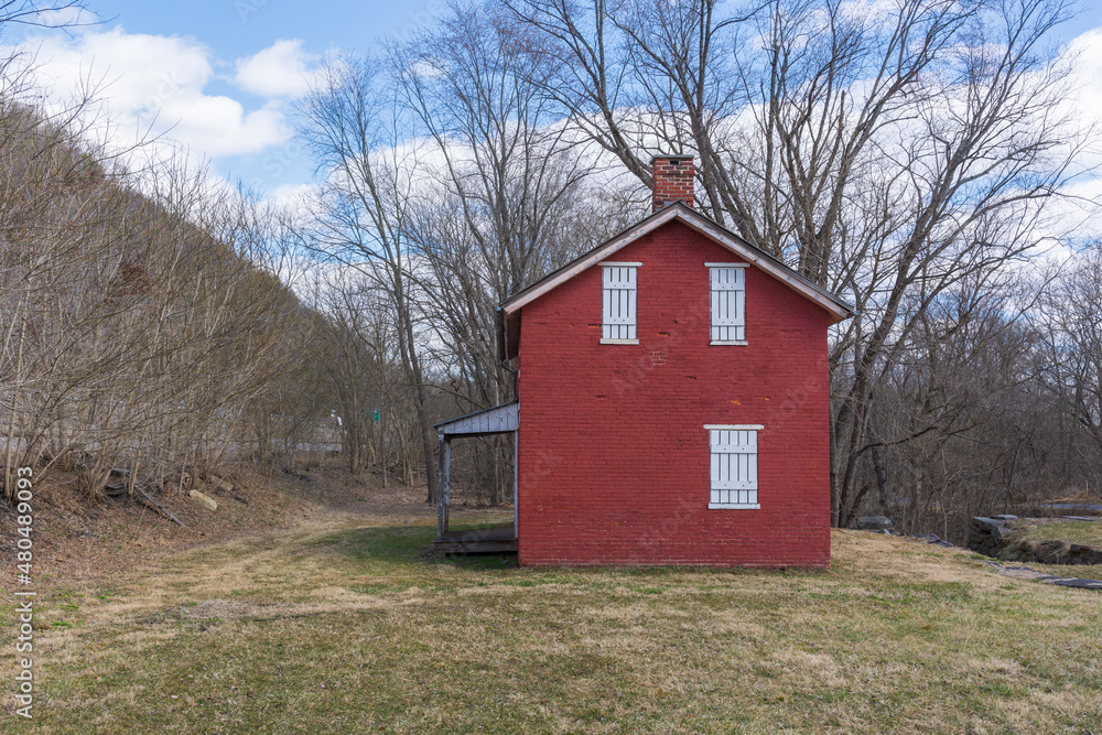 The lockhouse at Lock 31 on the Chesepeake and Ohio canal. Painted red ...