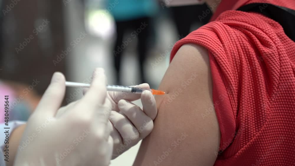 Video „Covid-19 vaccine injection by doctor at hospital. A doctor ...