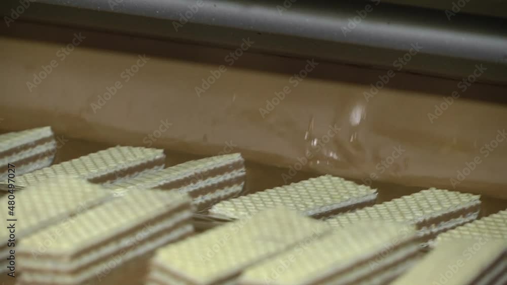 automated chocolate wafer baking production line at a confectionery ...