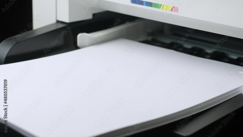 an office worker refills the printer with a4 paper Stock Video | Adobe ...