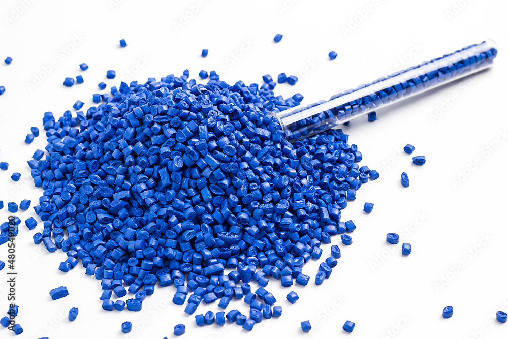 blue granules of polypropylene, polyamide. White background. Plastic ...