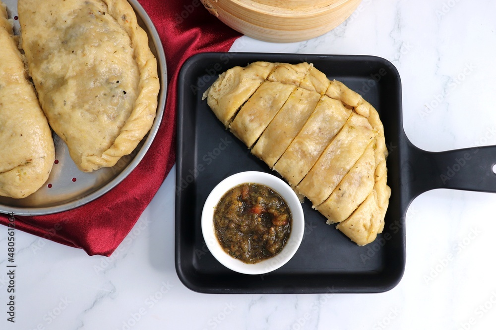 Himachal Pradesh special dish siddu. It's a steamed wheat flour bread ...