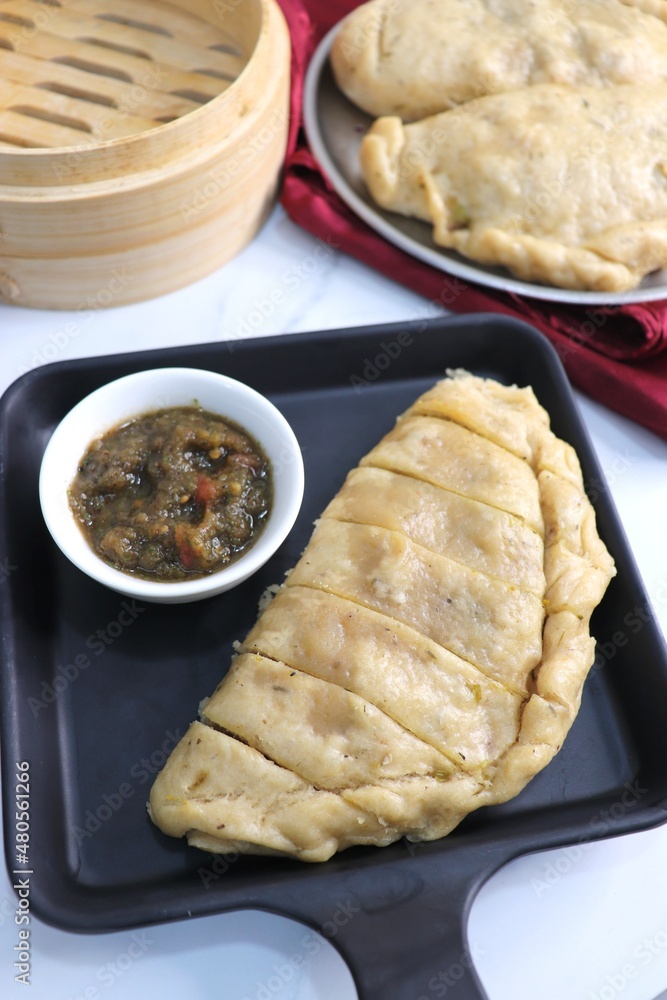 Himachal Pradesh special dish siddu. It's a steamed wheat flour bread ...