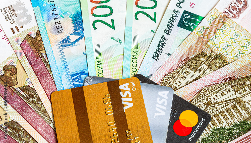 MasterCard and Visa with russian rubles banknotes Stock Photo | Adobe Stock