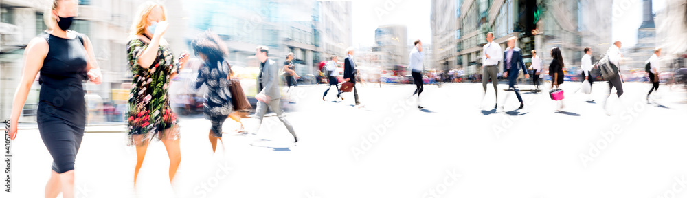 Abstract background with walking people blur. Modern city life, busy ...