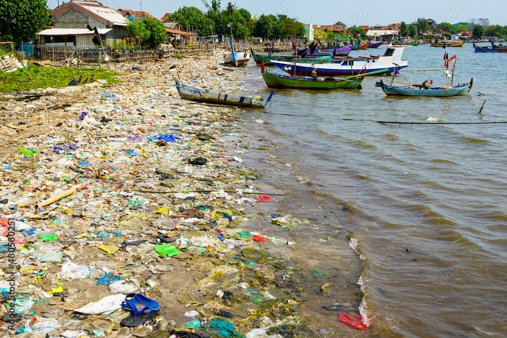 Garbage litters the beach which mostly consists of plastic waste ...