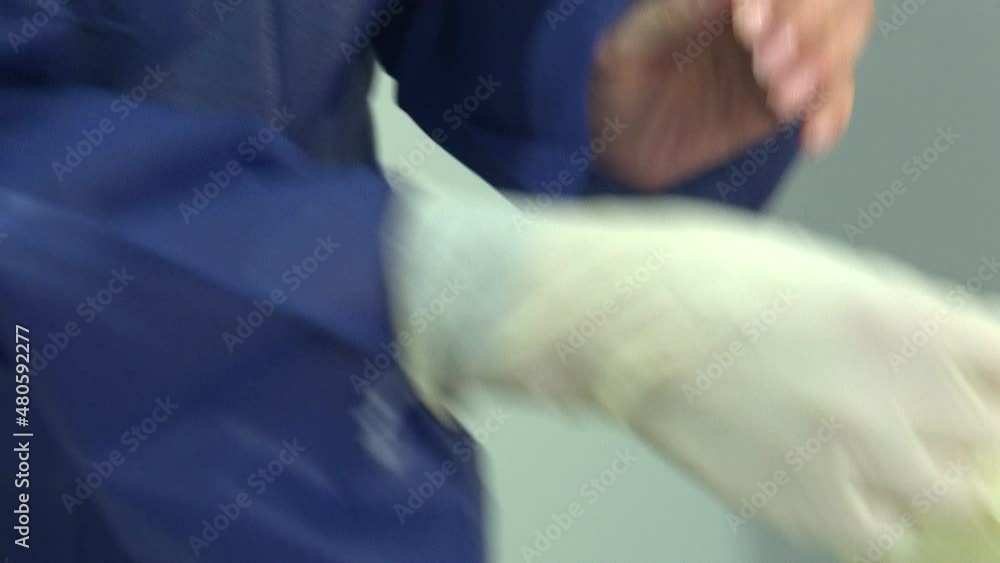 Doctor or nurse worker surgeon preparing for the surgical operation and ...