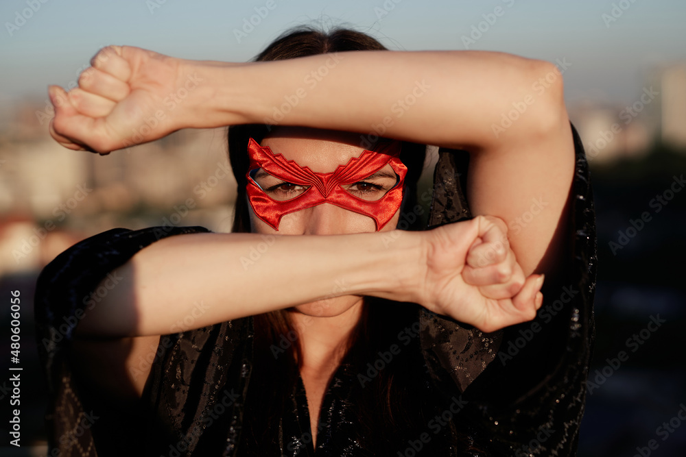 Female Power Concept Strong Supergirl In Black Dress And Red Face Mask