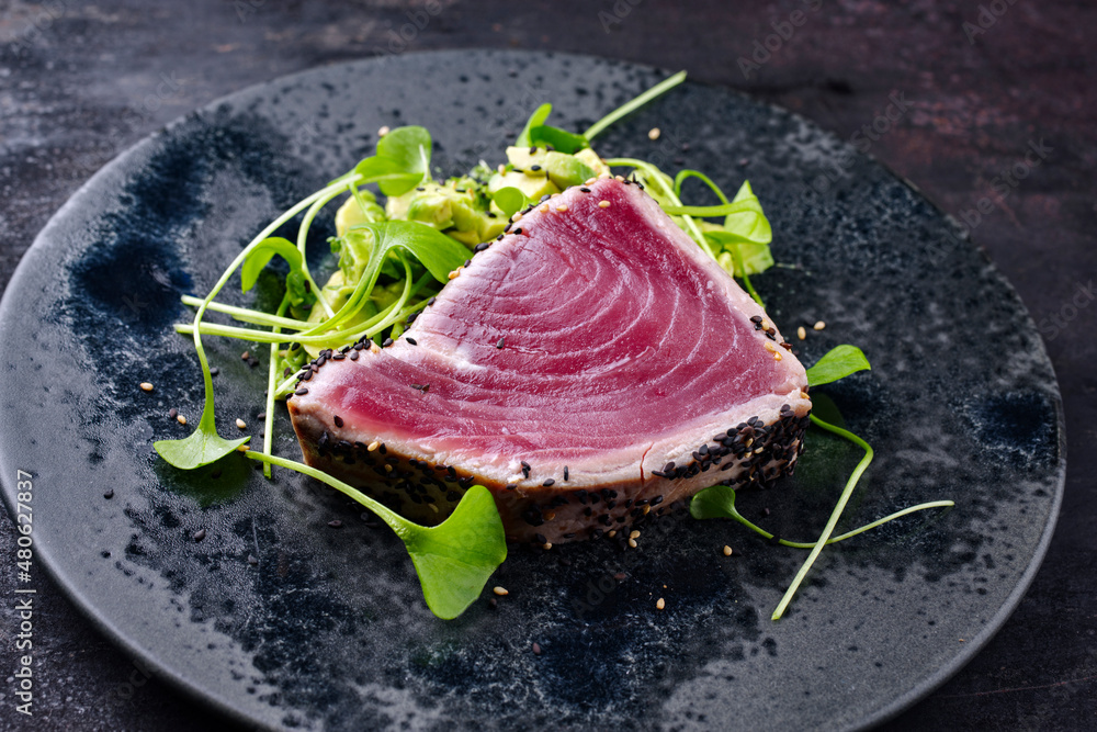 Modern style traditional Japanese gourmet seared tuna fish steak tataki ...