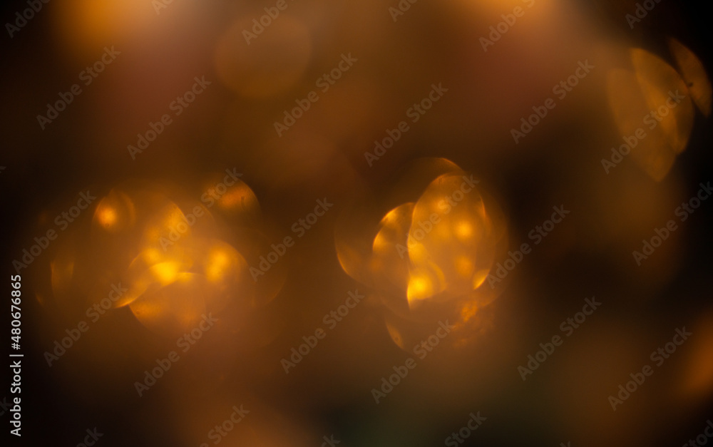 intentional soft focus or out of focus golden lights for special bokeh ...
