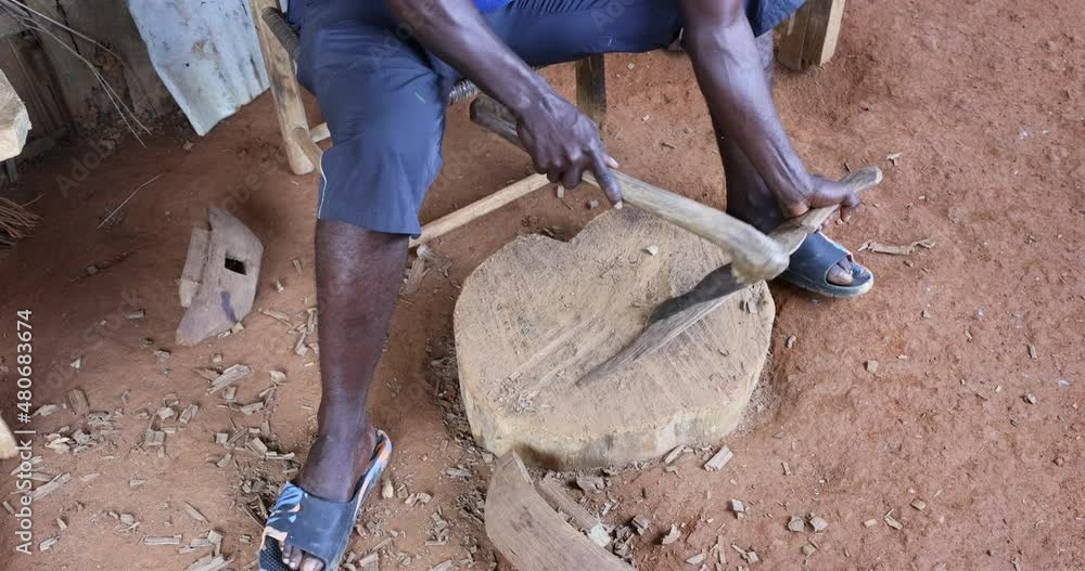 Wood carver art rural village Monrovia Liberia. Wood carver struggles ...