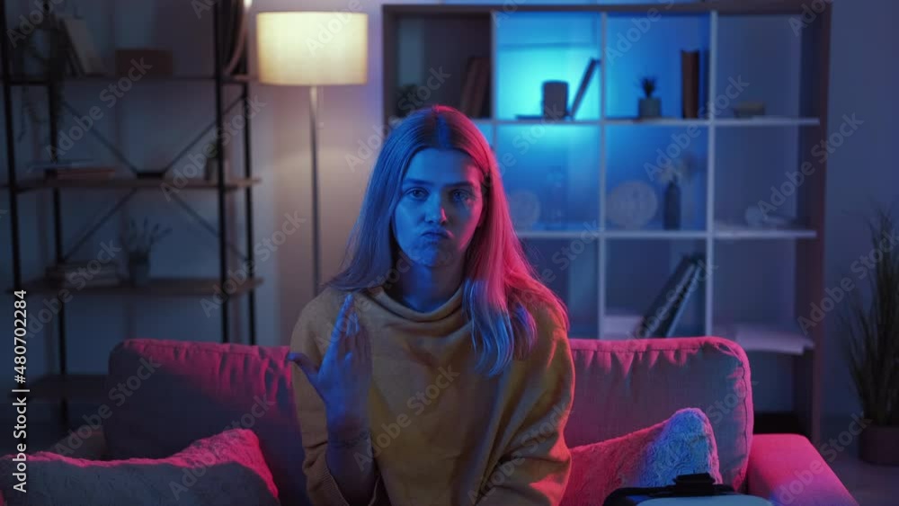 Boring evening. Female gamer. Cyber entertainment. Upset disappointed ...