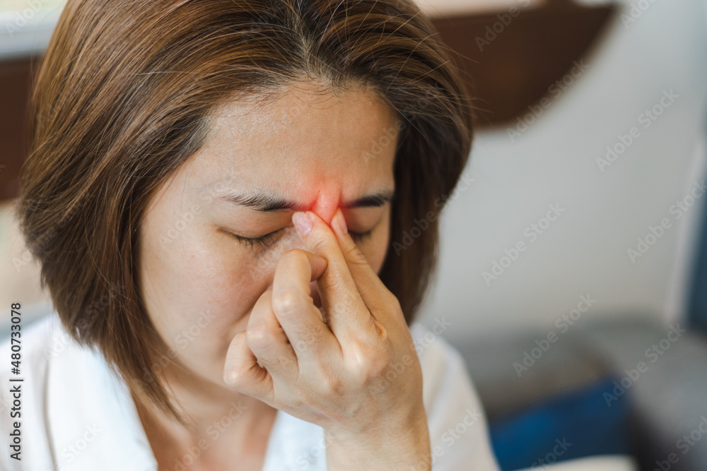 Sinus,Sinusitis, or rhinosinusitis concept. Asia woman suffer from ...
