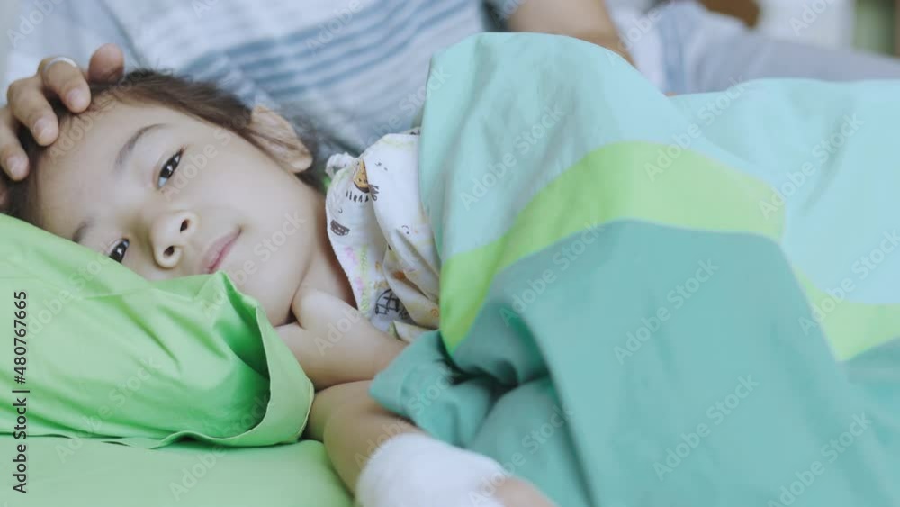Close up adorable face of asian girl kid who is sick due to virus ...