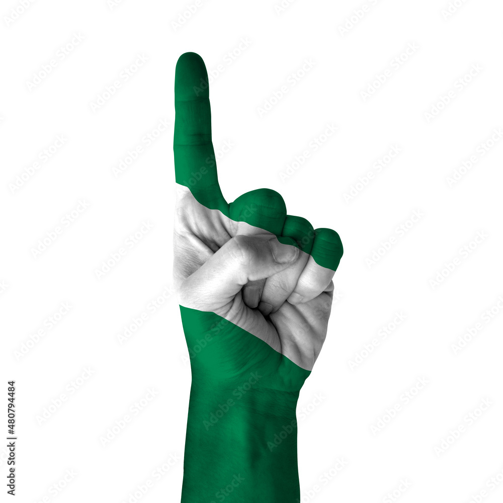 Hand pointing thumb up direction, nigeria painted with flag as symbol ...