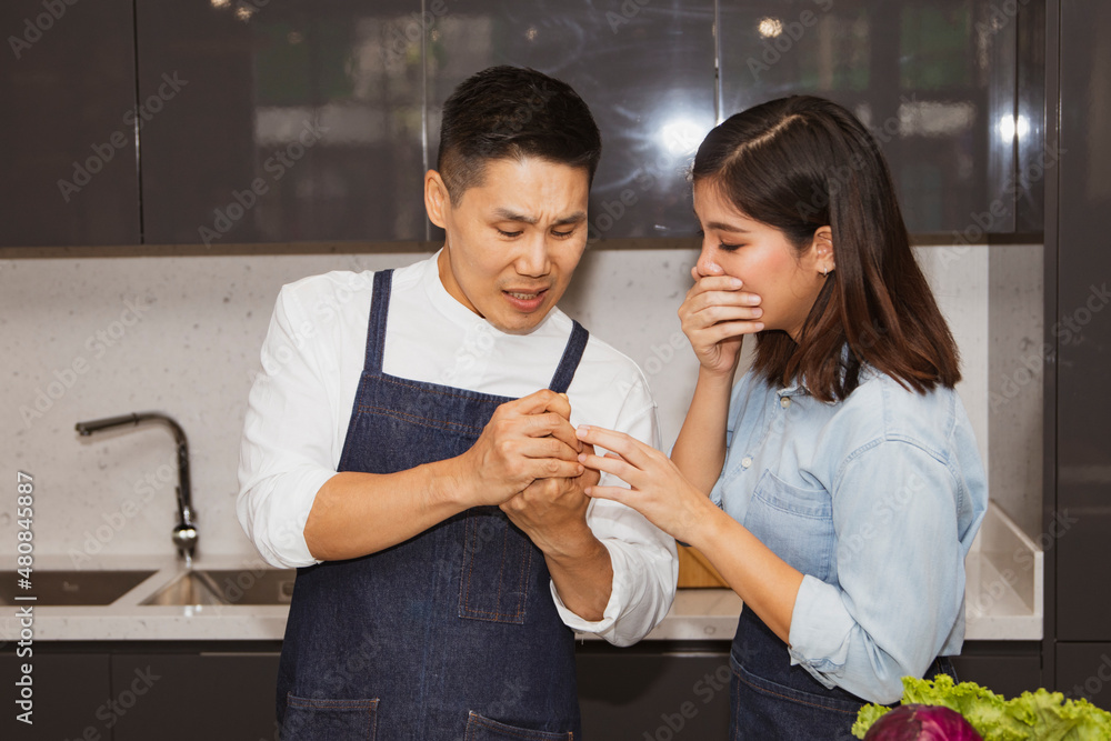 Concept kitchen knife cut accident : Young man suffered finger pain in ...