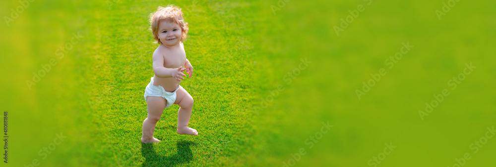 Banner with spring child face. First step. Baby standing barefoot on ...