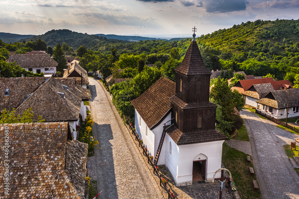 Poster Holloko, Hungary - Aerial view of the traditional catholic ...