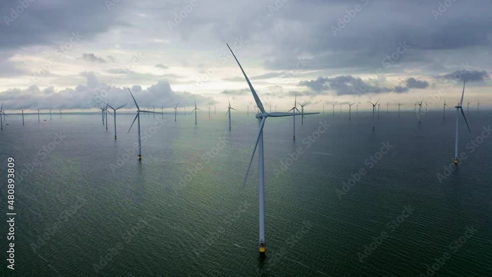 Drone video of the offshore wind turbine at Fryslan wind farm in the ...