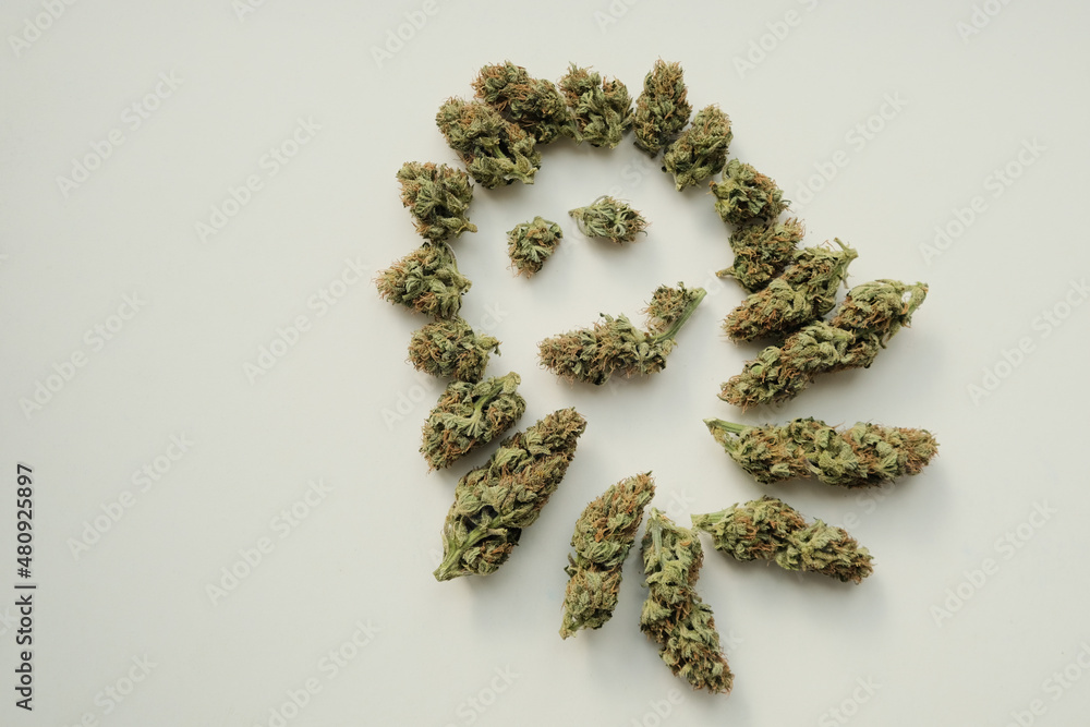 Happy face made with marijuana buds, top view. Smiley face. Cannabis ...
