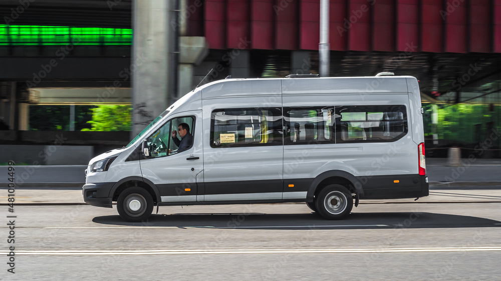Ford Transit Fourth generation in the city street. Side view of white ...