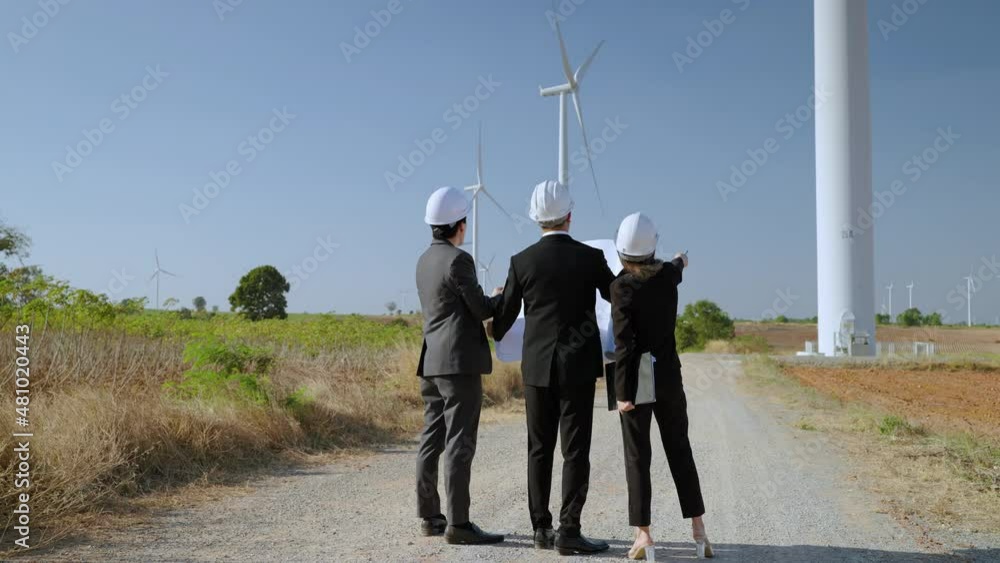 inspector and an engineer with a secretary are inspecting a project in ...