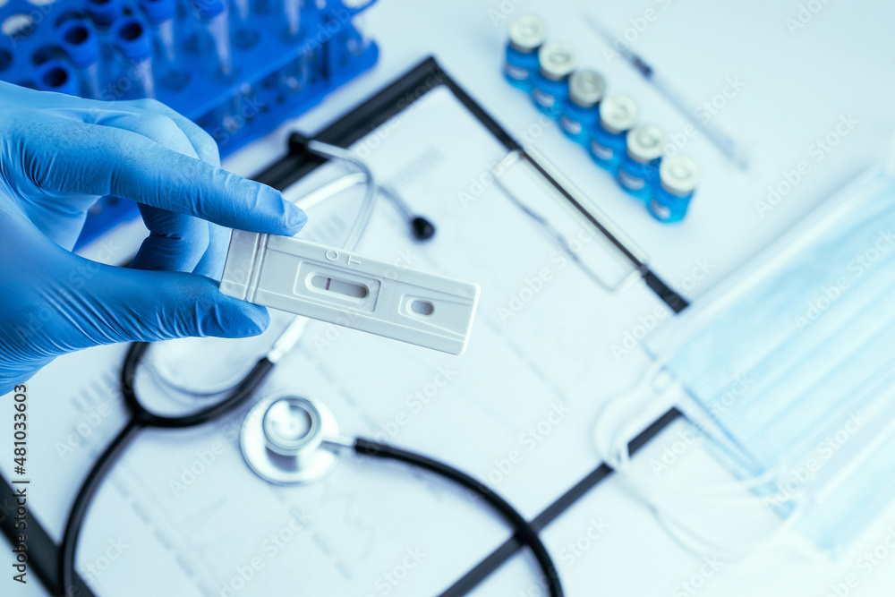 Sars test antigen coronavirus kit. Doctor holding rapid covid medical ...