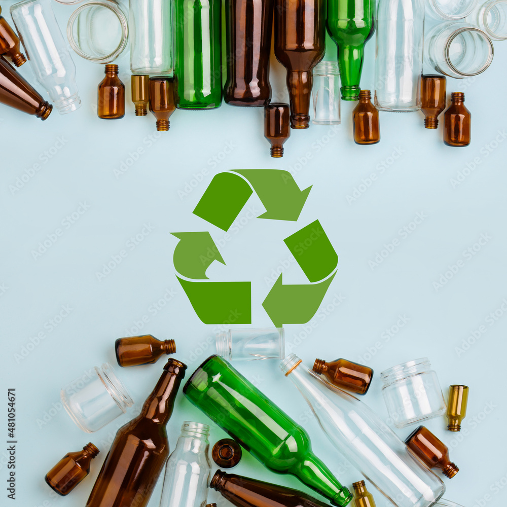 Separate collection of glass garbage. Colorful bottles and cans for ...