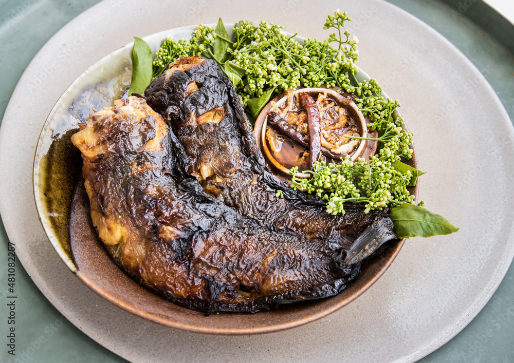 Grilled catfish (Roasted Catfish) and neem leaf served with sweet ...