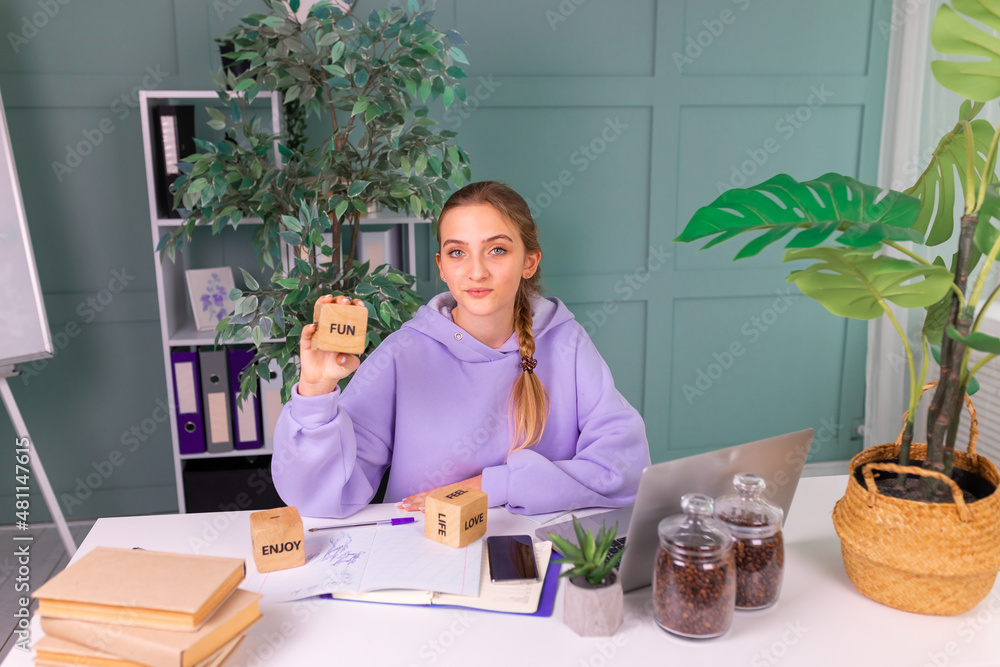 Happy smiling teenage girl student watching learning online video zoom ...