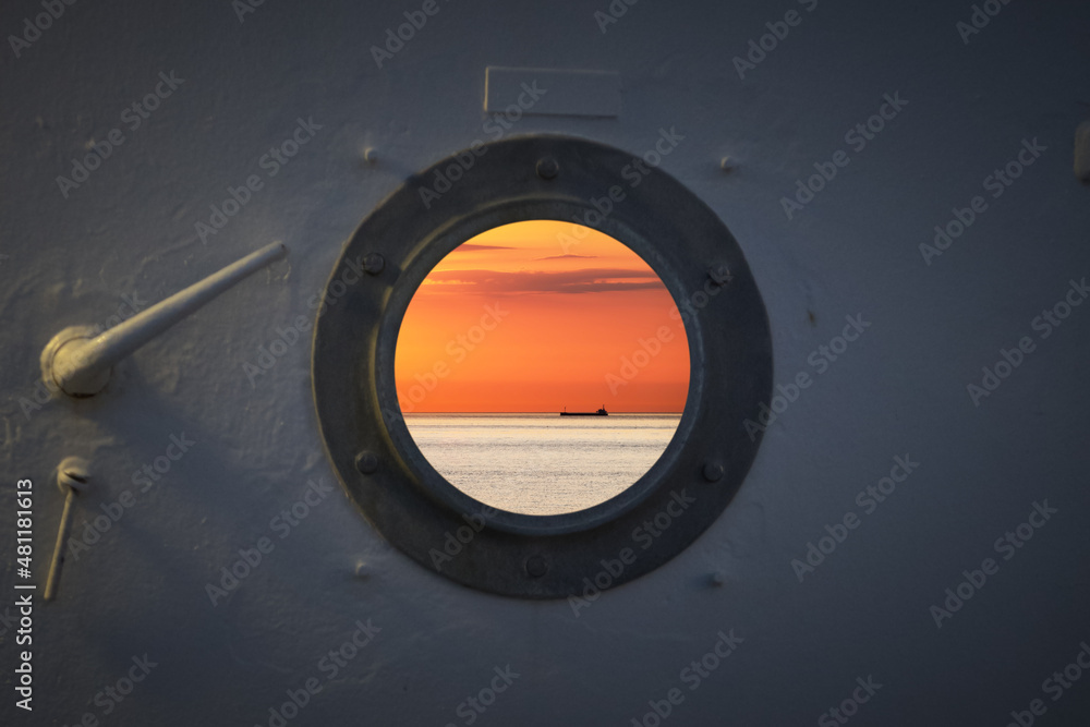 Lonely fishing ship trawler boat on ocean water. View from the round ...