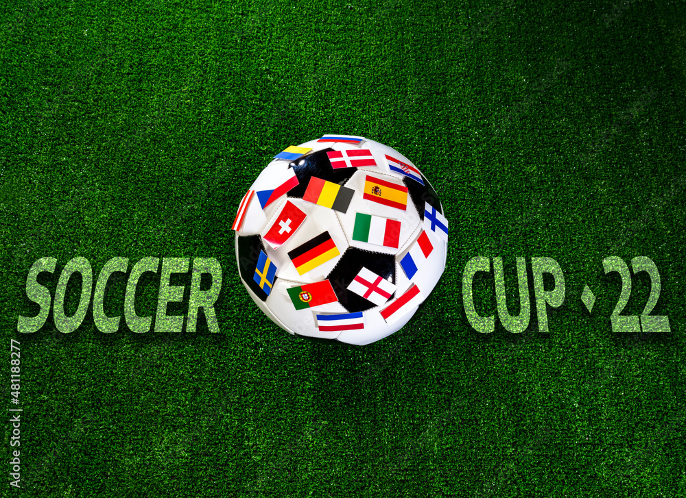 World football cup 2022 with close up of soccer ball with flags of ...