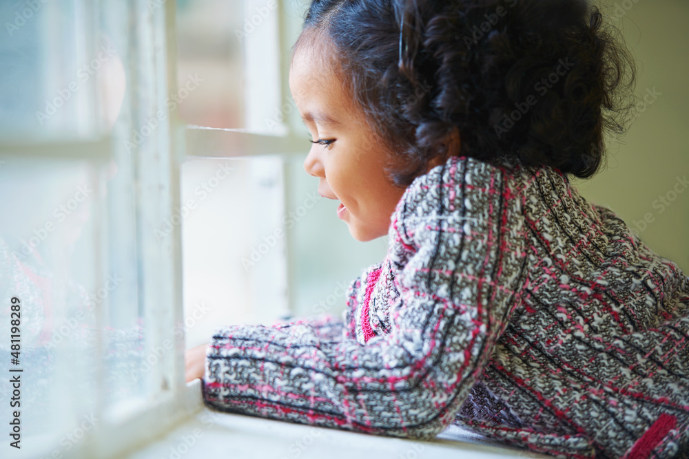 Learning as she grows. Shot of a cute little girl at home. Stock Photo ...
