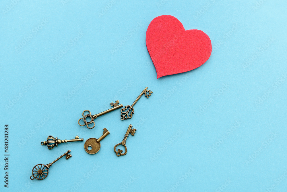 Vintage keys with a red heart . Valentine's Day background. The concept ...