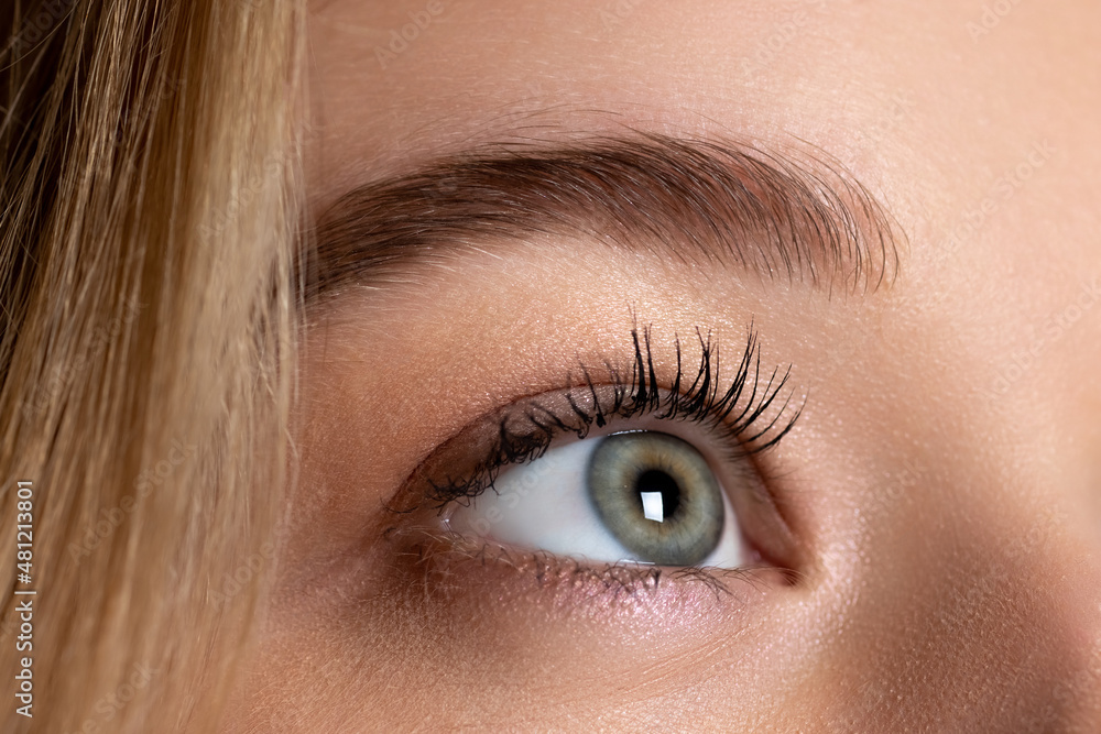 Cropped close-up face of young beautiful well-kept skinned girl without ...