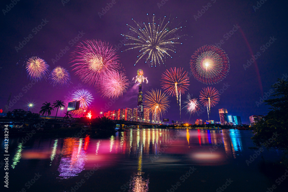 Celebration. Skyline with fireworks light up sky over Landmark 81 ...