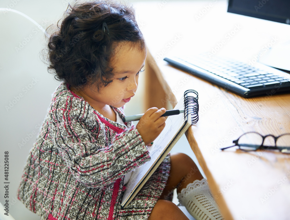 Learning as she grows. Shot of a cute little girl at home. Stock Photo ...