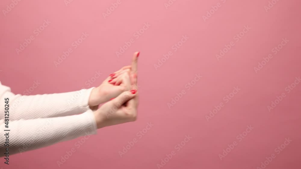 Profile side view closeup of woman hand showing middle finger, impolite ...