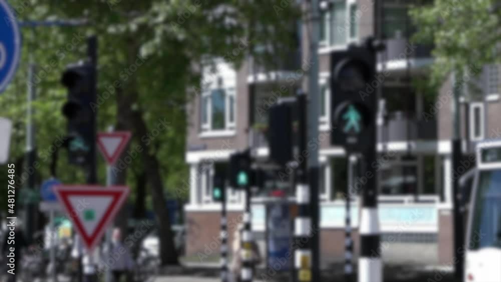 Blurred defocused European pedestrian crosswalk sign. Traffic lights ...