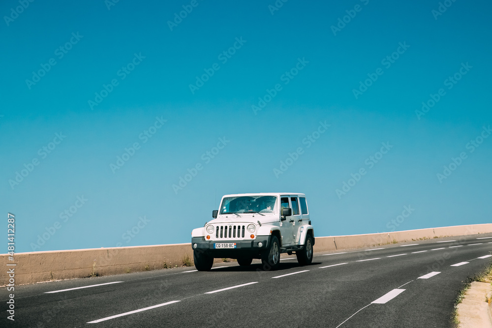 Jeep Wrangler (JK) drive in mountains road. third generation of the ...