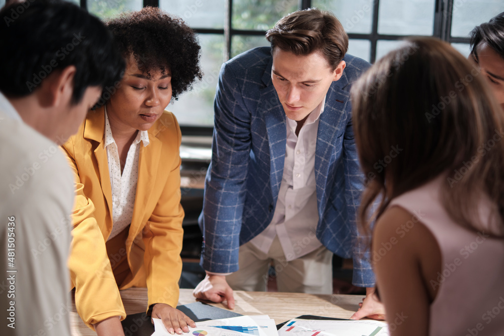Multiracial coworkers' team and colleagues brainstormed, discussing ...