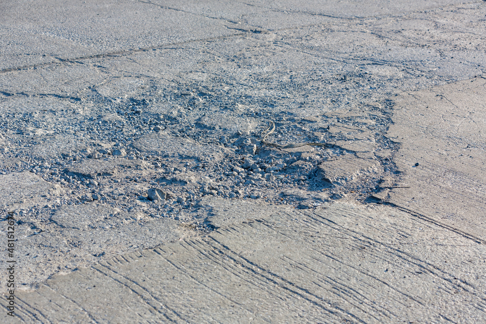 Crack in concrete street textured background. old concrete cement with ...