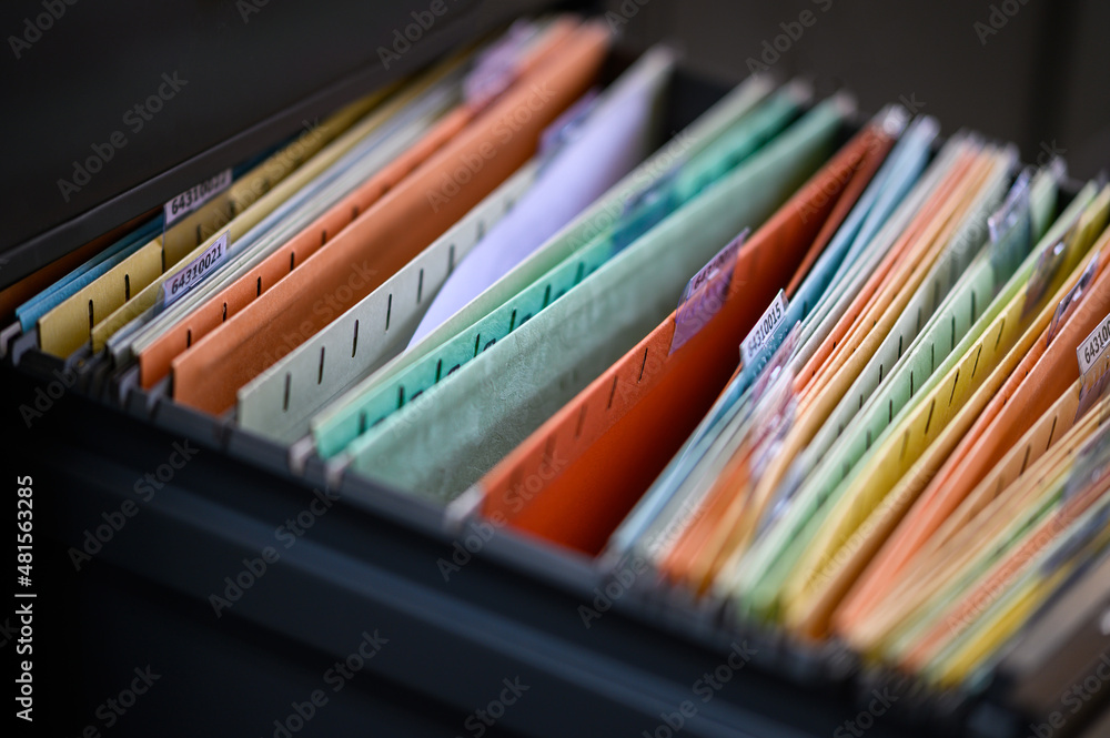 document file paperwork in files placed in the filing cabinet Stock ...