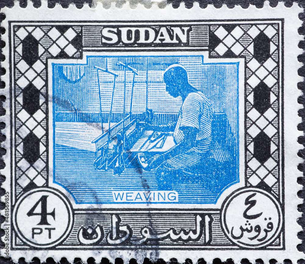 Sudan - Circa 1951 A postage stamp from Sudan showing a weaver at a ...