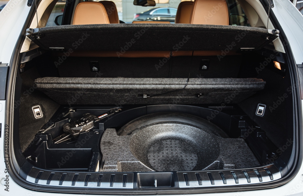 Luxury car boot with folded seats. Opened empty car trunk. Clean trunk ...