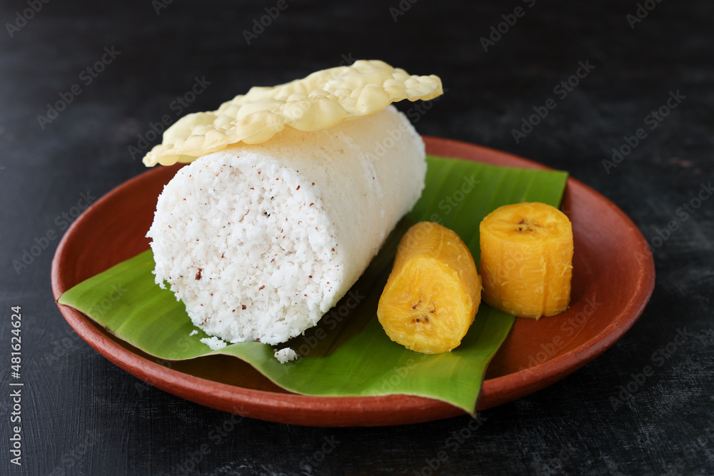 Popular South Indian breakfast puttu / pittu made of rice flour and ...