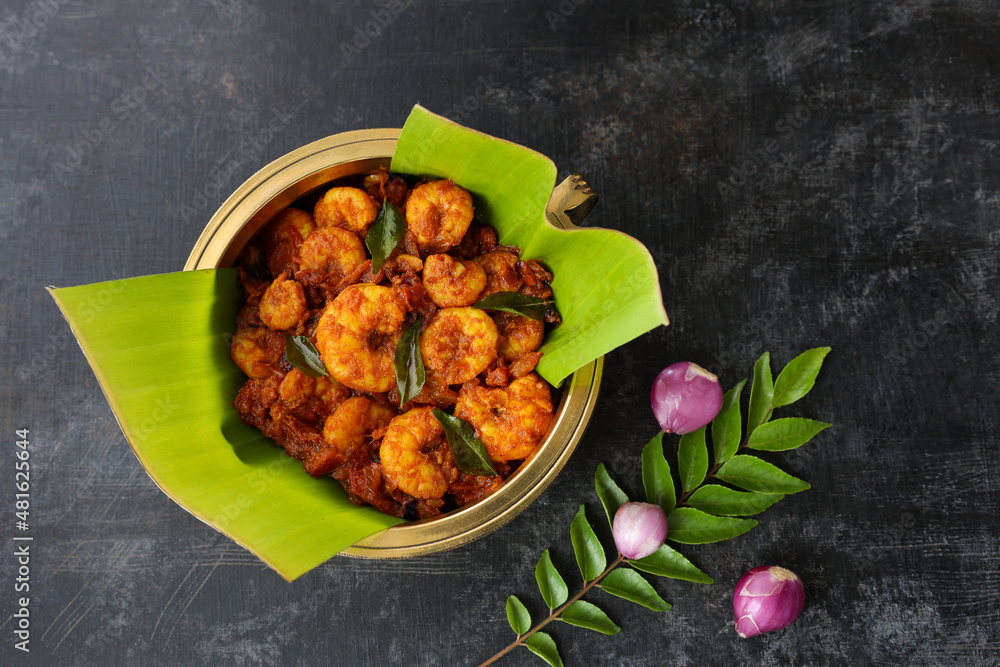 Top view spicy hot Prawn roast shrimp fry masala fish curry. Indian ...