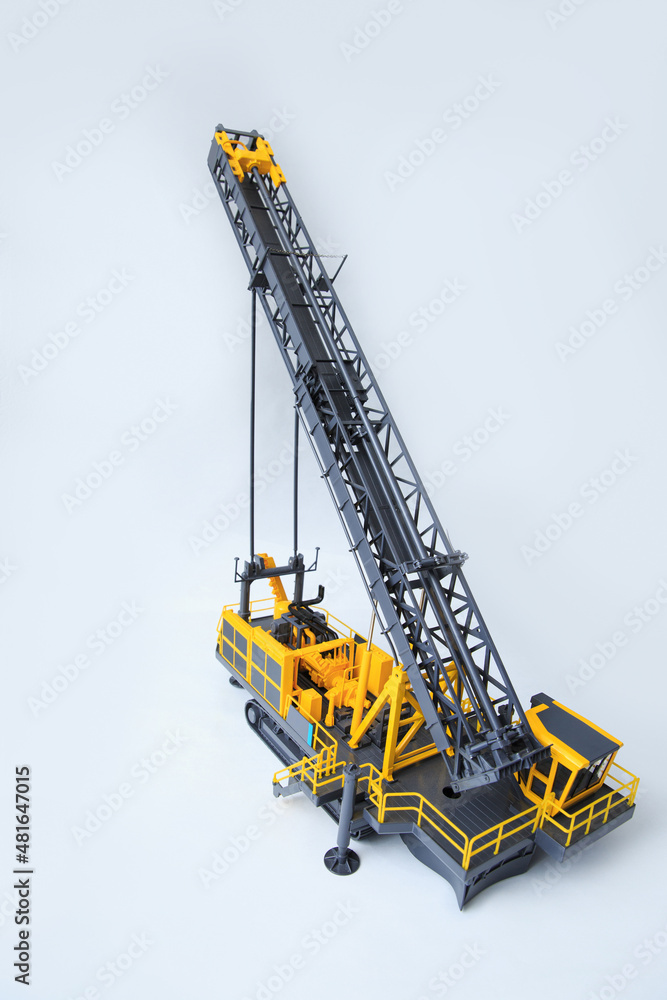 Large drill rig for drilling boreholes for explosives on a white ...